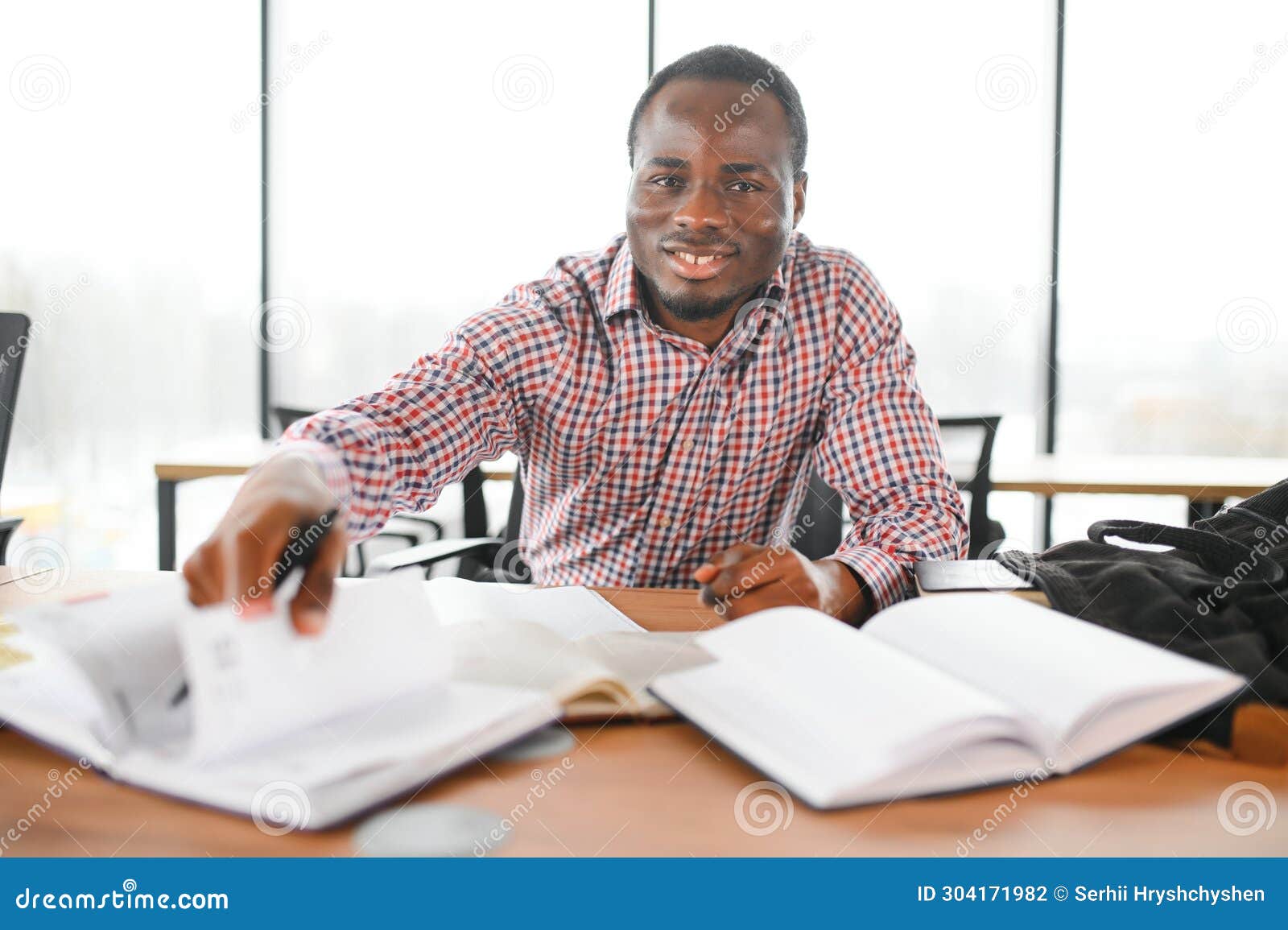 African Student Sitting in Classroom. Male Student during the Lecture ...