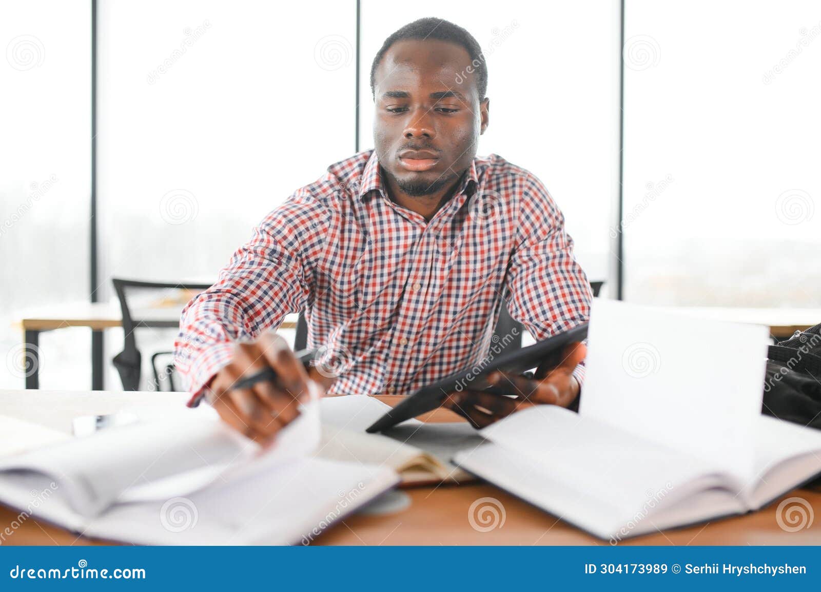 African Student Sitting in Classroom. Male Student during the Lecture ...