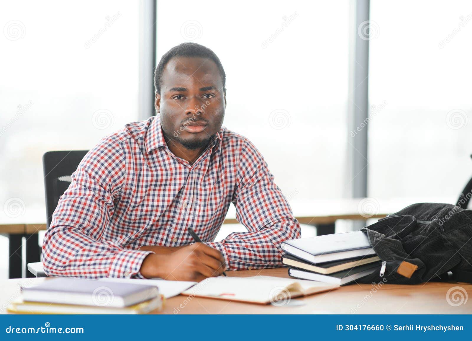 African Student Sitting in Classroom. Male Student during the Lecture ...