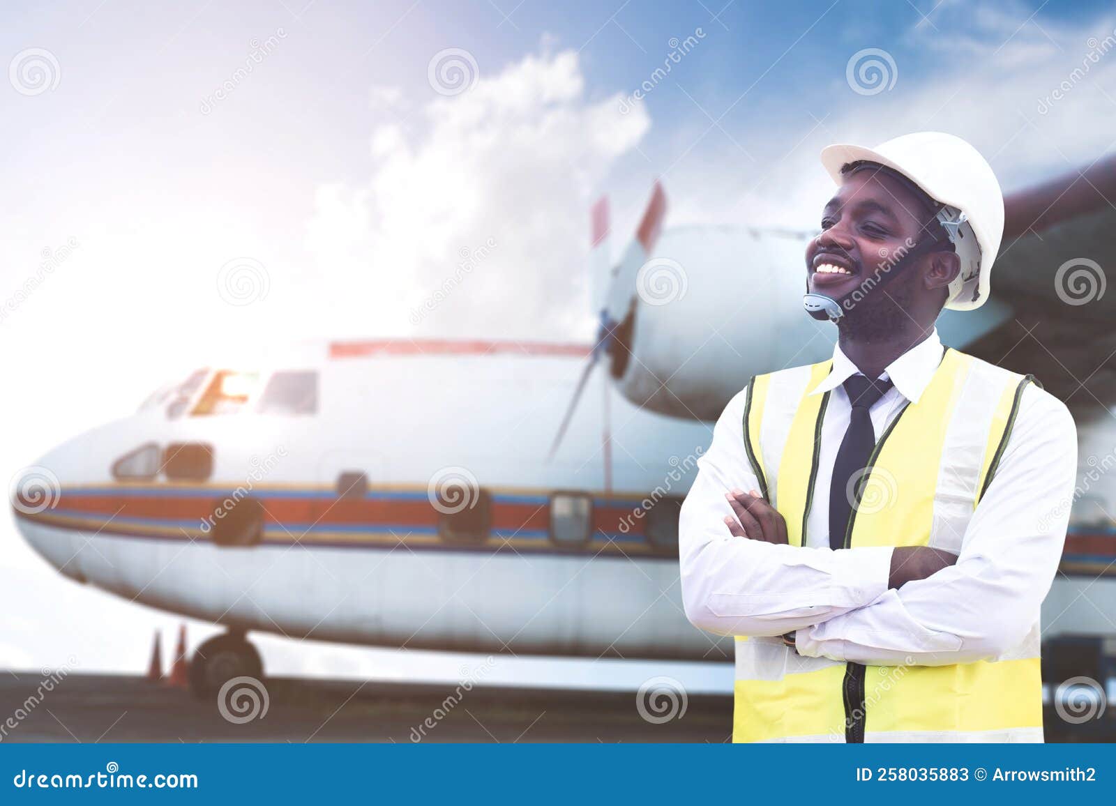 African Technician Engineer Fixing the Engine of the Airplane Stock ...