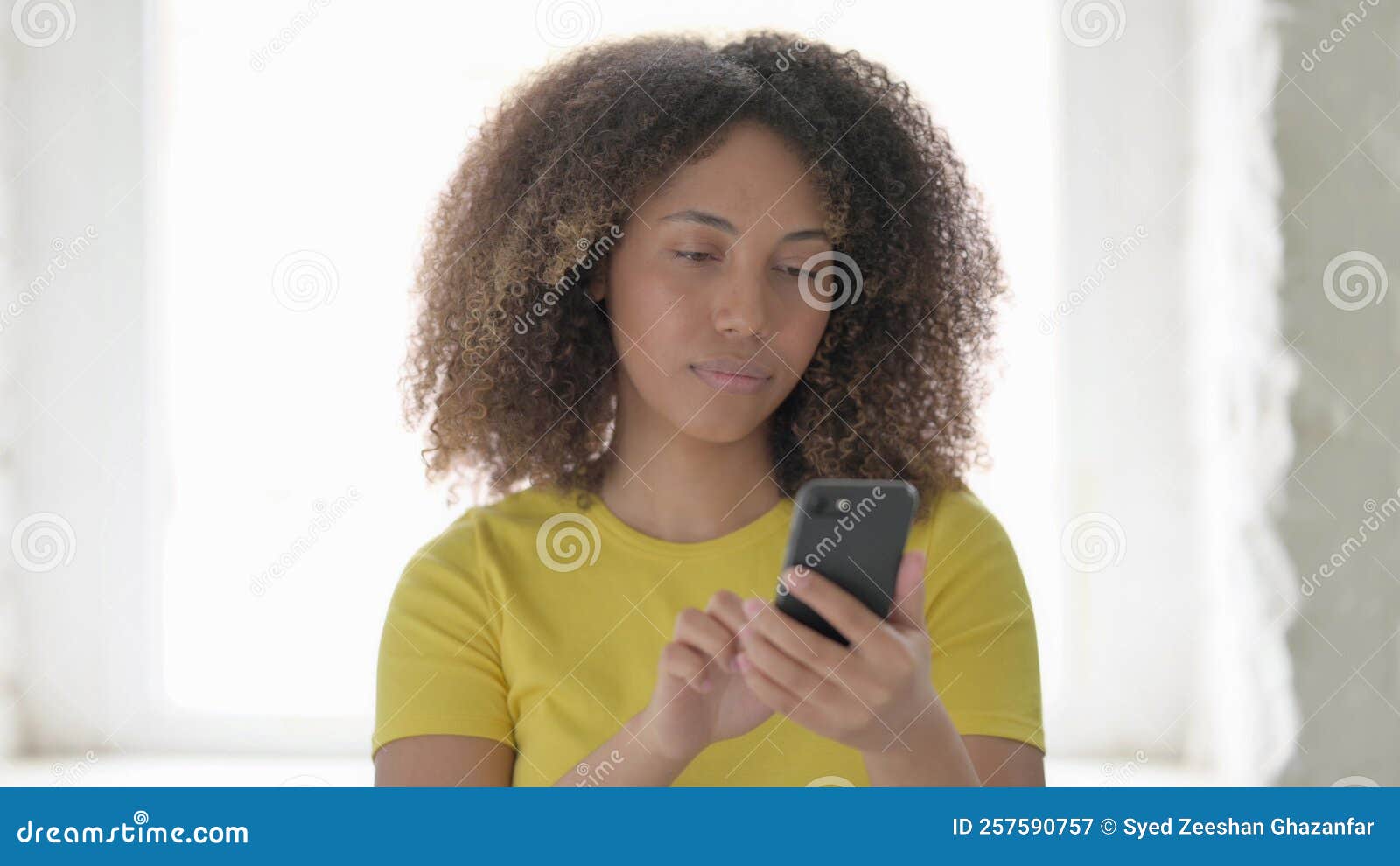 African Woman Browing Internet on Smartphone Stock Image - Image of ...