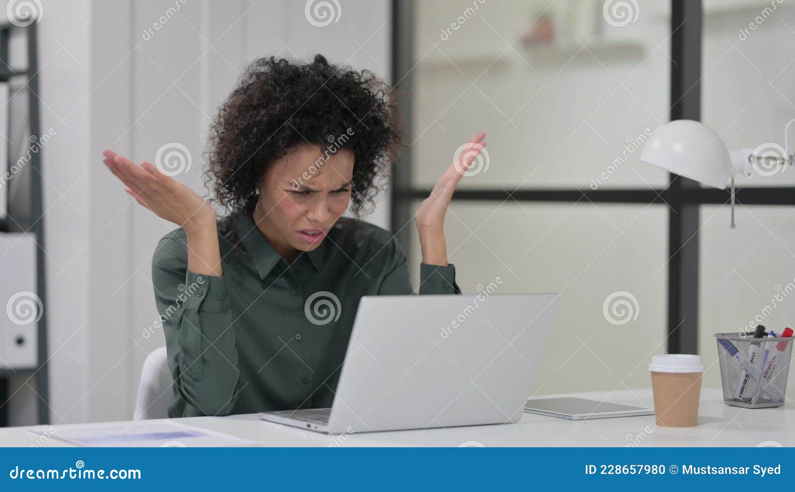 African Woman Feeling Disappointed while Using Laptop Stock Photo ...