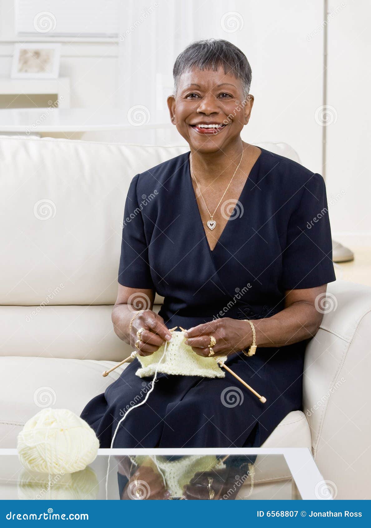 African Woman Knitting on Sofa at Home Stock Image - Image of home ...
