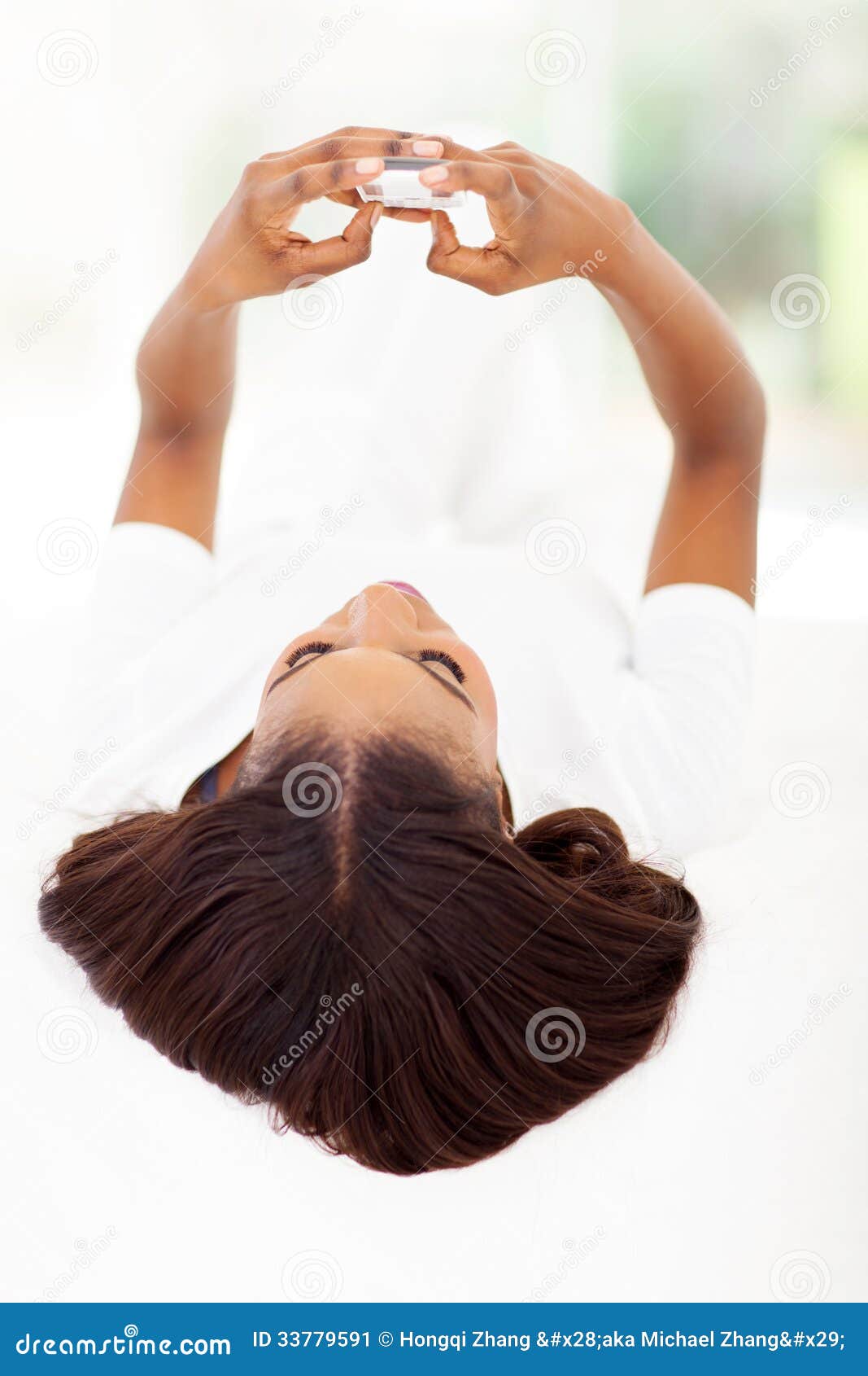 African woman text message stock image. Image of bedroom - 33779591
