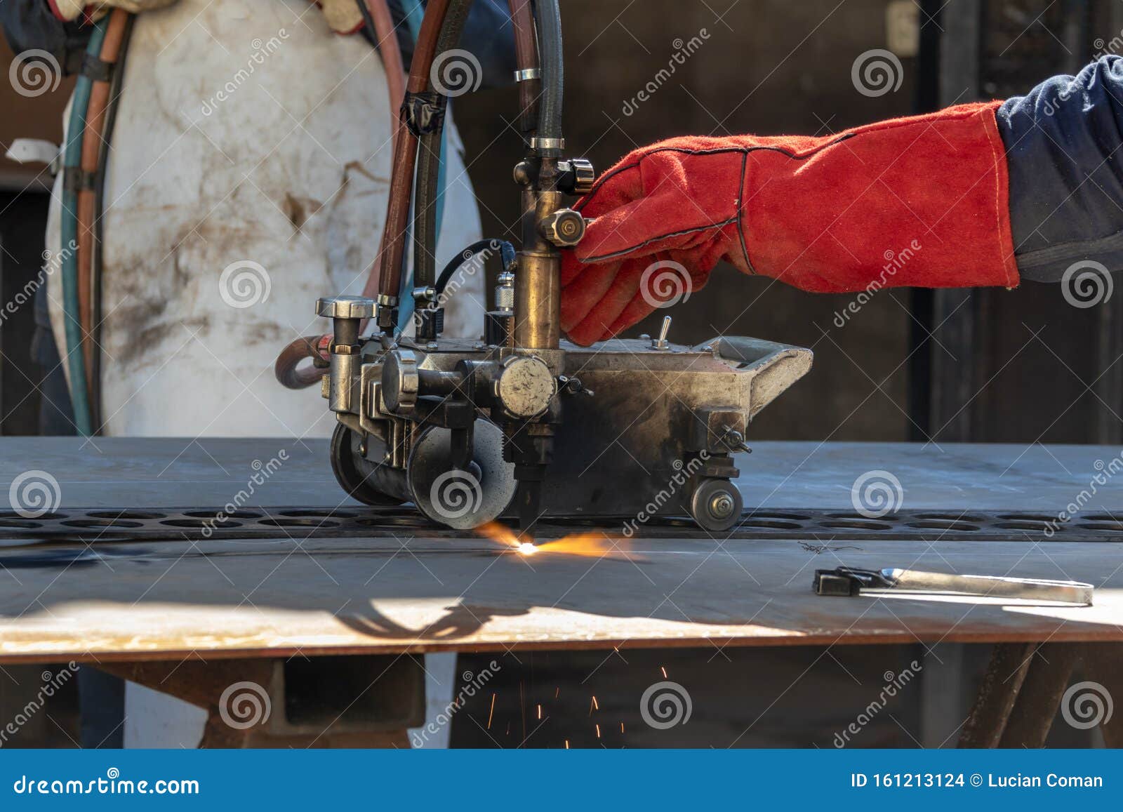 African Worker with a Cutting Torch Stock Photo - Image of mechanical ...