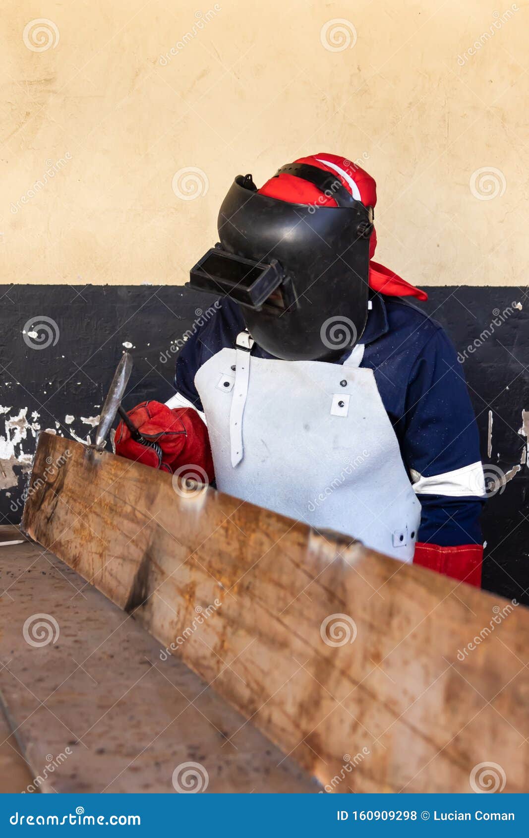 African Worker Welder with Red Gloves Stock Photo - Image of person ...