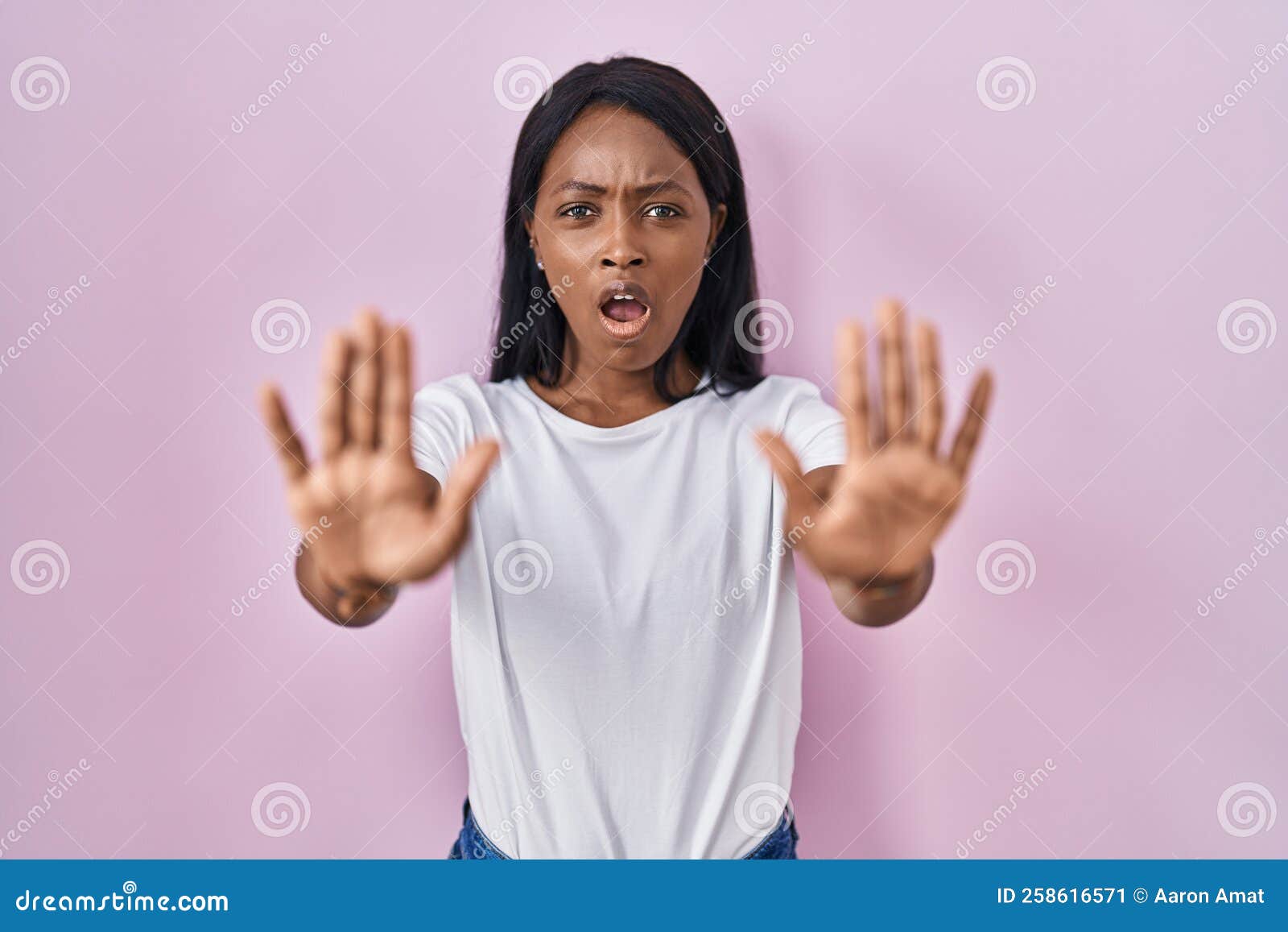 African Young Woman Wearing Casual White T Shirt Doing Stop Gesture