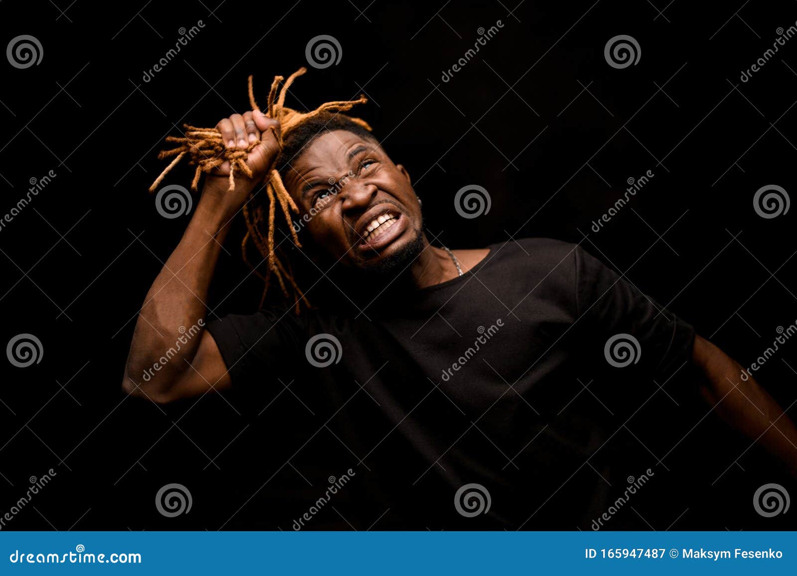 Afro American Guy Pulling His Ginger Dreadlocks Stock Image - Image of ...