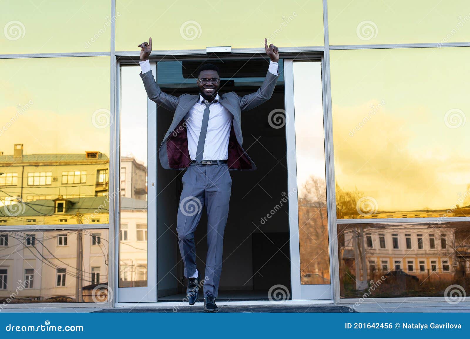 Afro American Man Walks Out of Building Happy Stock Photo - Image of ...