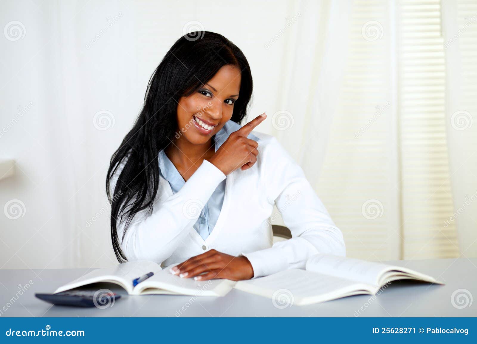 Afro-american Student Smiling and Pointing Stock Image - Image of ...