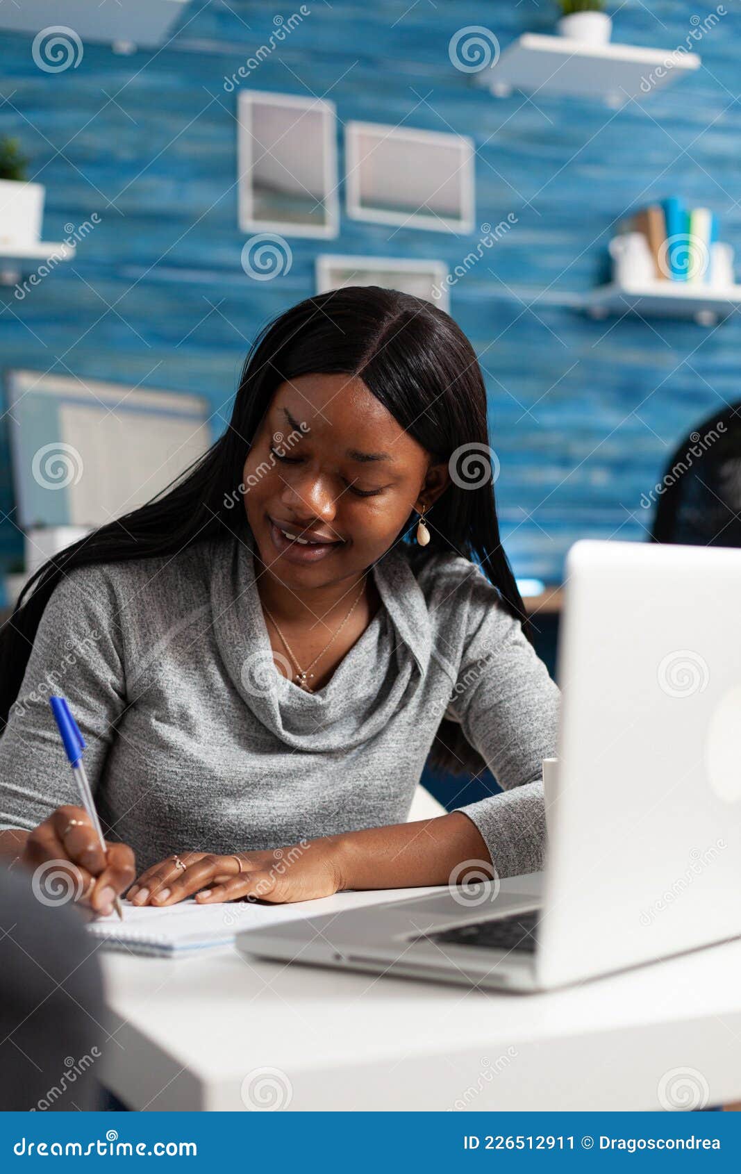 Afro American Student Writing Math Homework on Notebook during High ...