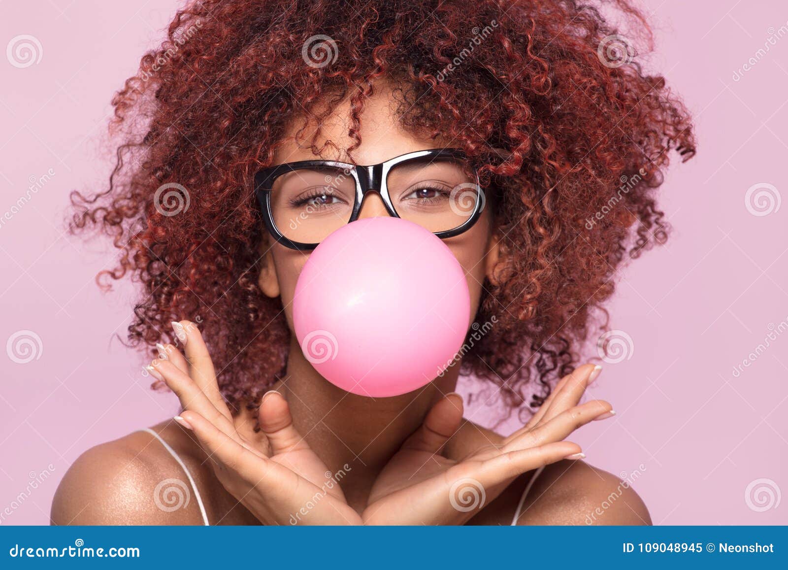 Girl Blowing Bubble Gum