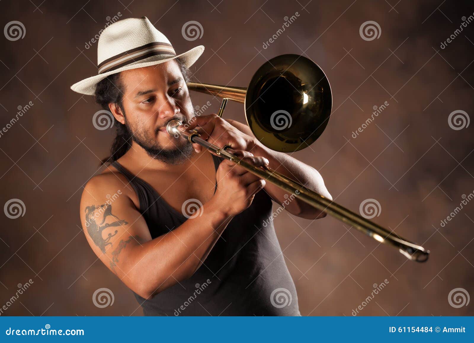 Afro Man Playing Trombone stock photo. Image of orchestra - 61154484