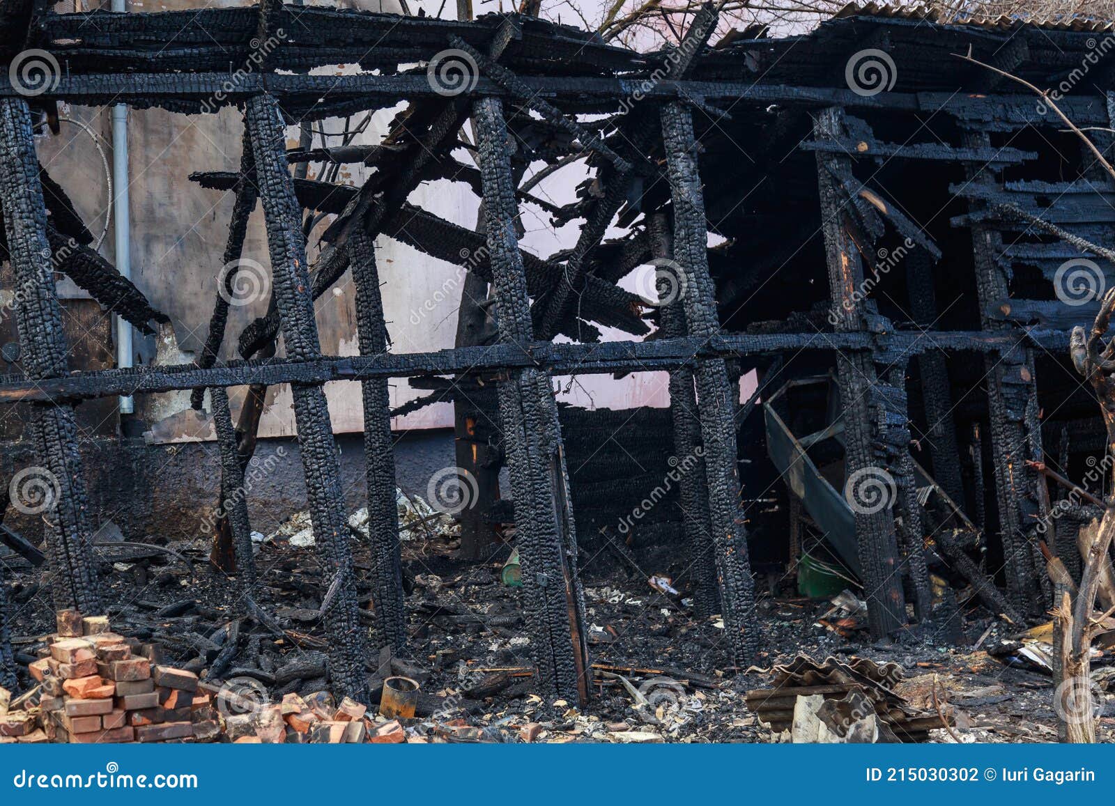 The Aftermath of a Fire in Old Wooden Sheds Stock Photo - Image of ...