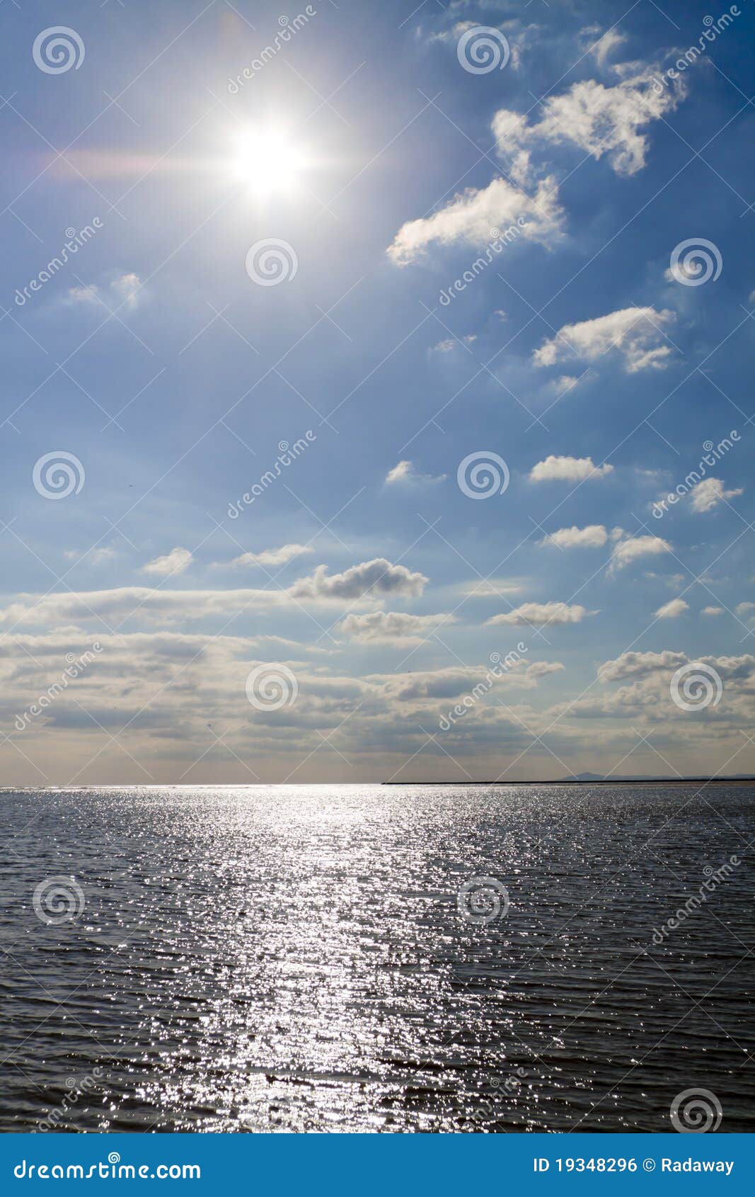 Afternoon sun over the sea stock photo. Image of blue - 19348296