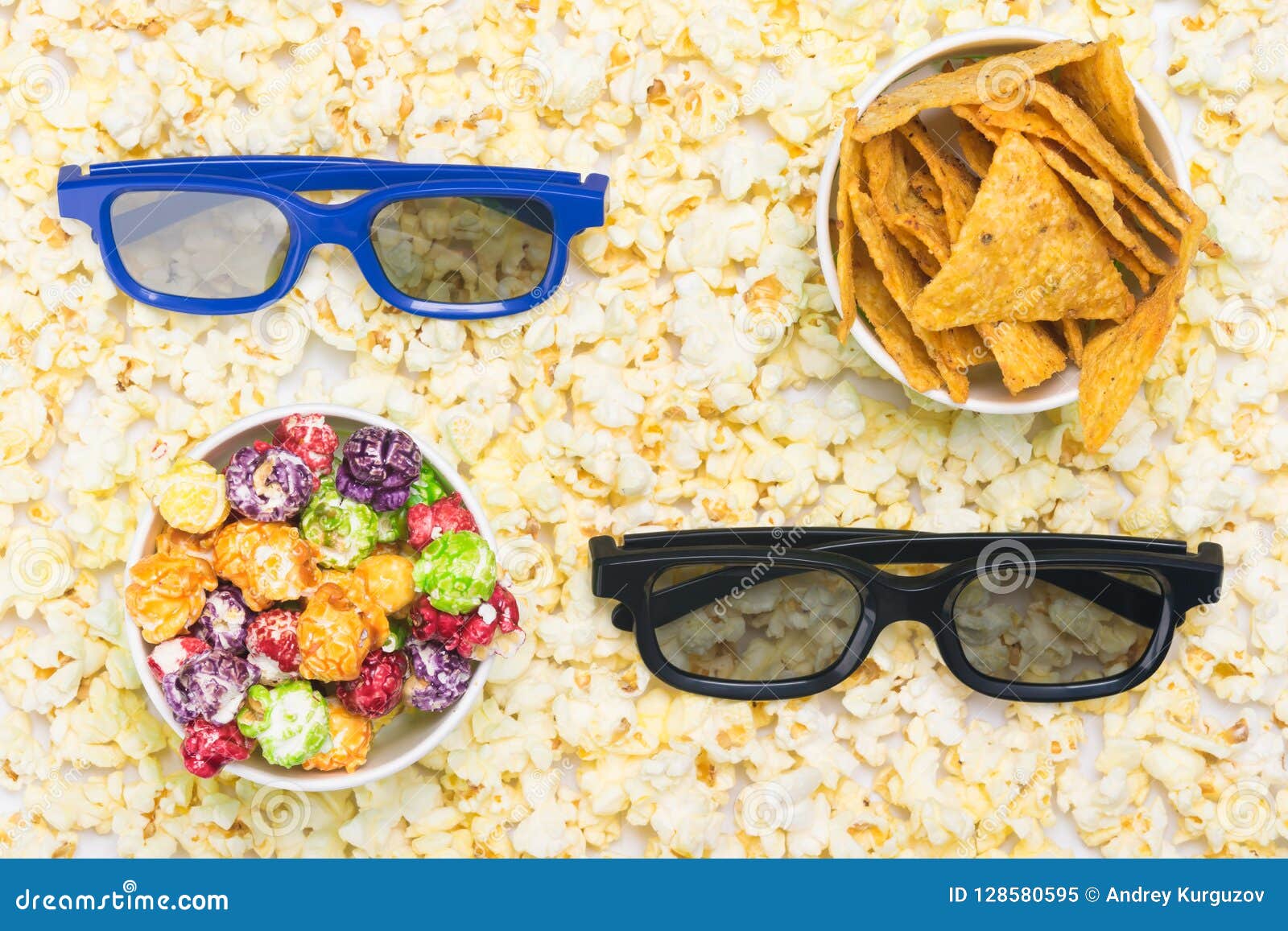 Against the Background of Popcorn Grains Two Cups with Different ...