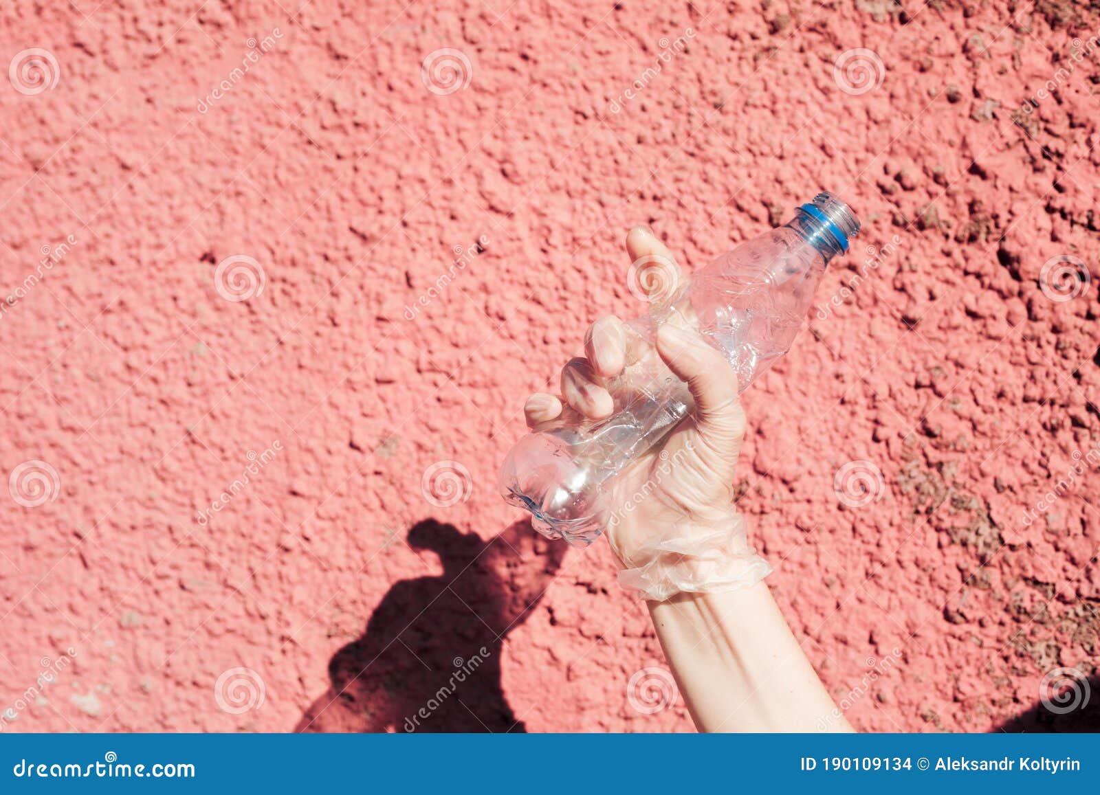 We Are Against Plastic Garbage. Hand Clutches An Empty Disposable ...