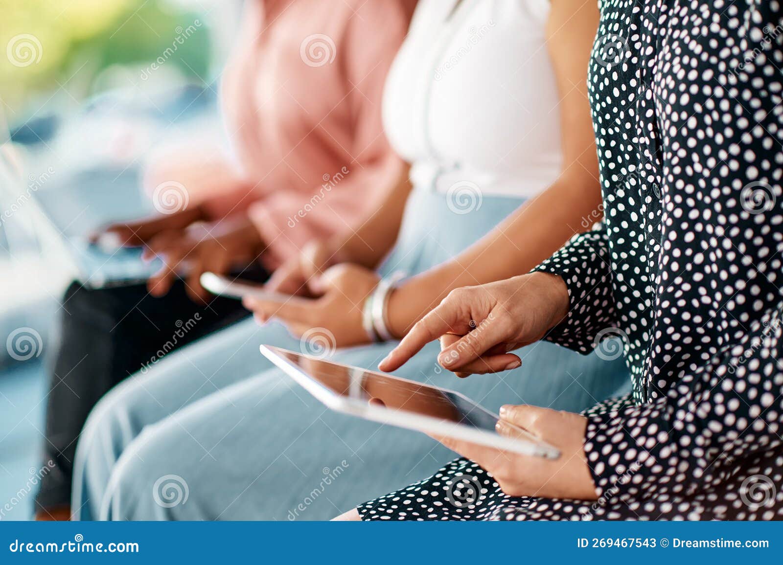 In this Age we Touch while we Wait. a Group of Unrecognizable ...