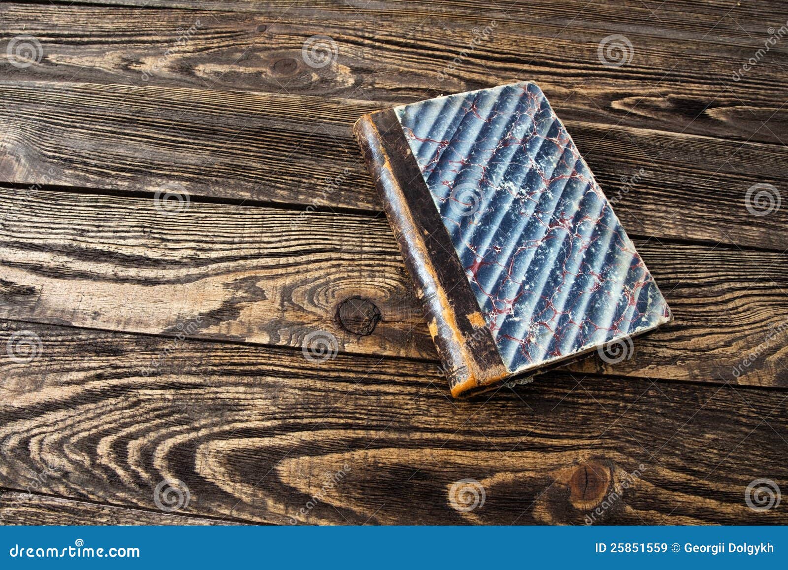 Aged book on wooden table stock image. Image of frame - 25851559