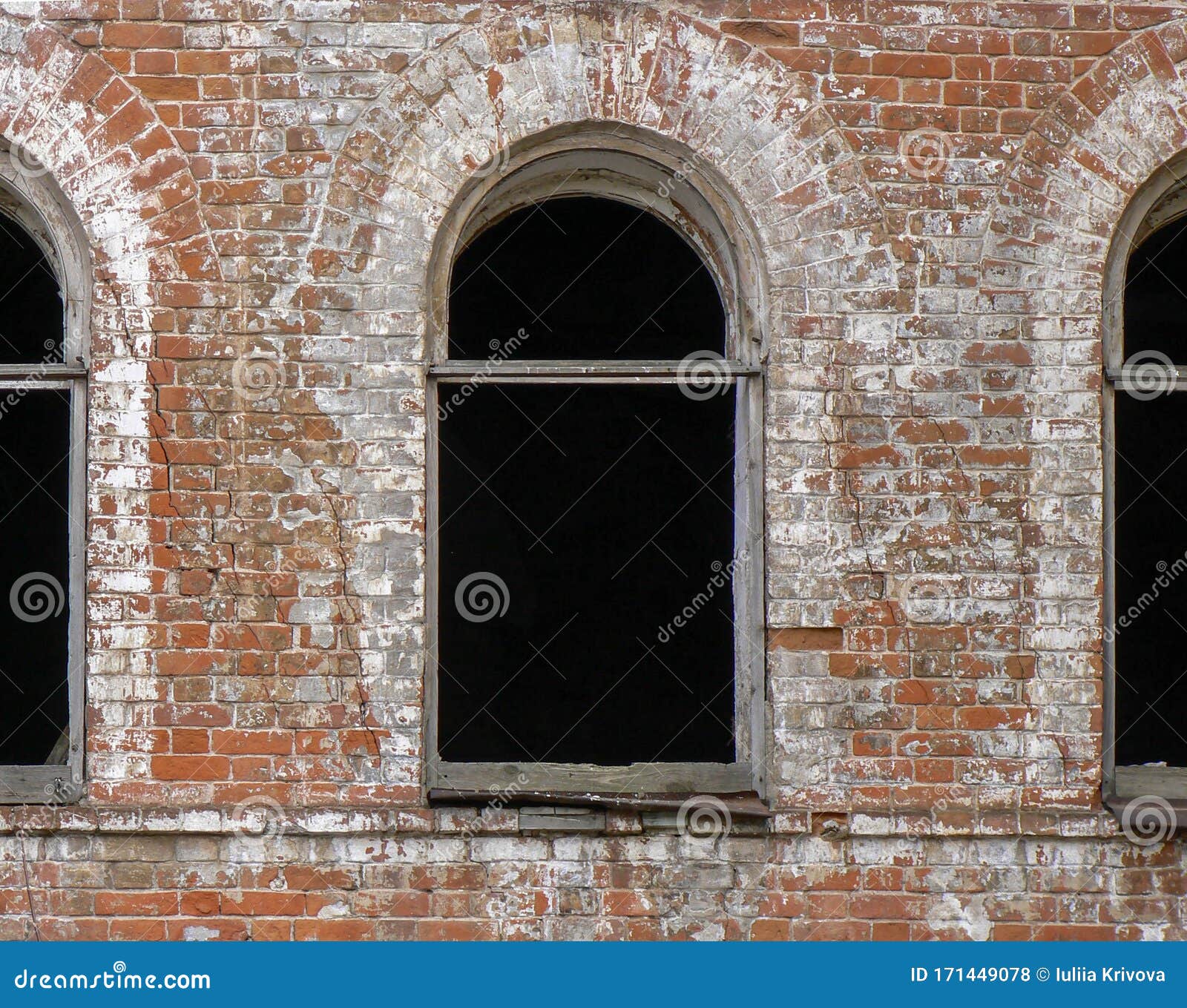 Aged Brick Wall with Arched Bricked Up Windows Stock Photo - Image of ...