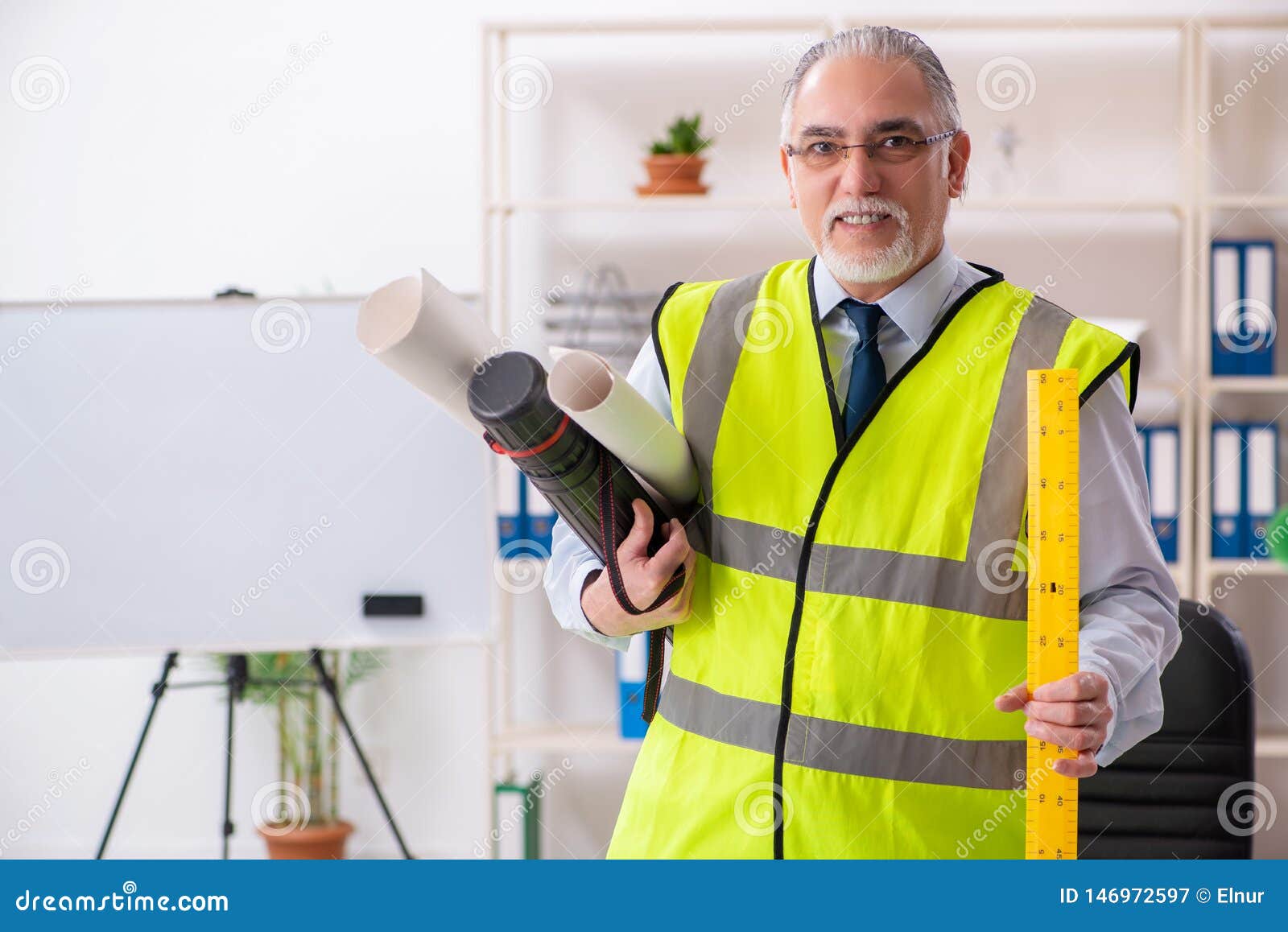 The Aged Construction Engineer Working in the Office Stock Image ...