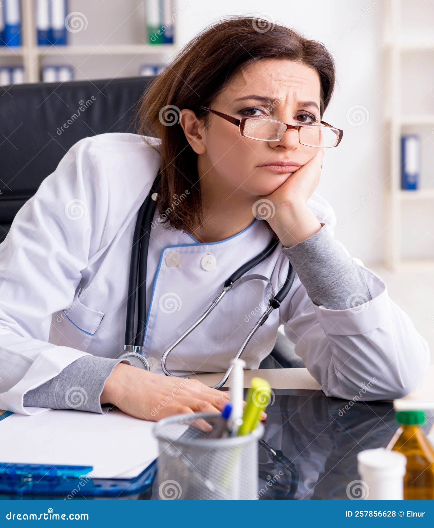 Aged Female Doctor Working in the Clinic Stock Photo - Image of ...