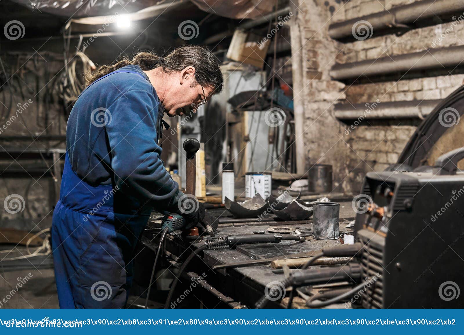Locksmith Processes the Workpiece Using an Angle Grinder Stock Photo ...