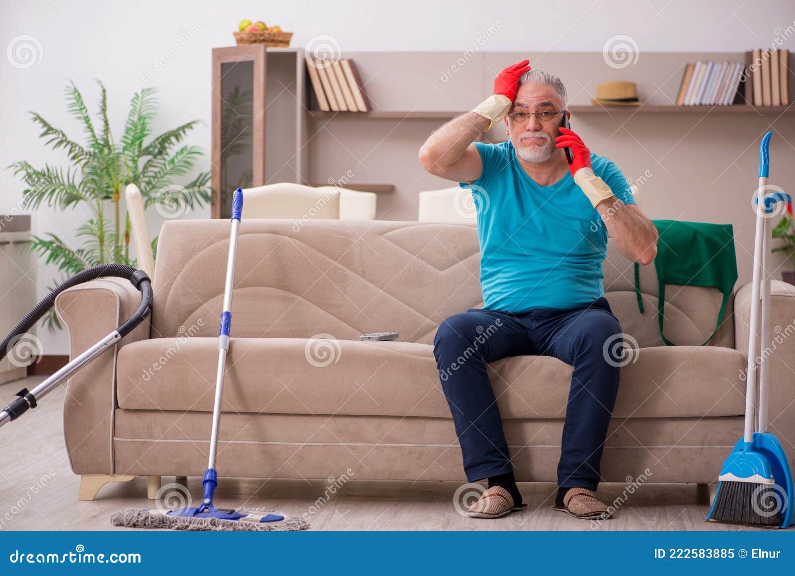 Old man cleaning the house stock image. Image of frustrated - 222583885