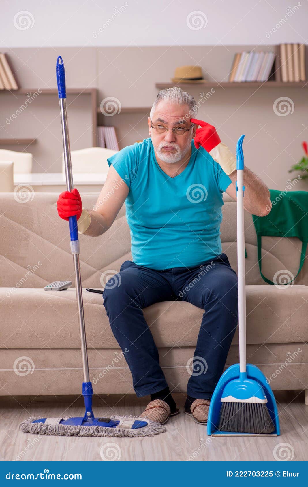 Old man cleaning the house stock image. Image of indoors - 222703225