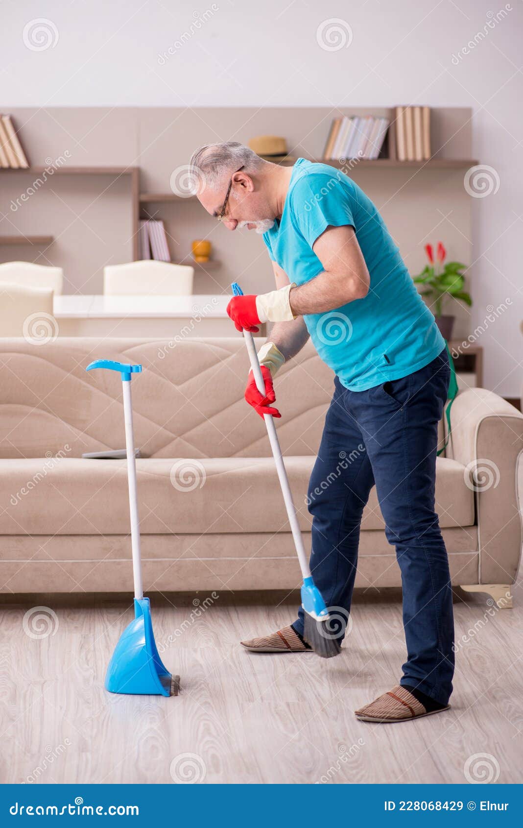 Old man cleaning the house stock image. Image of home - 228068429