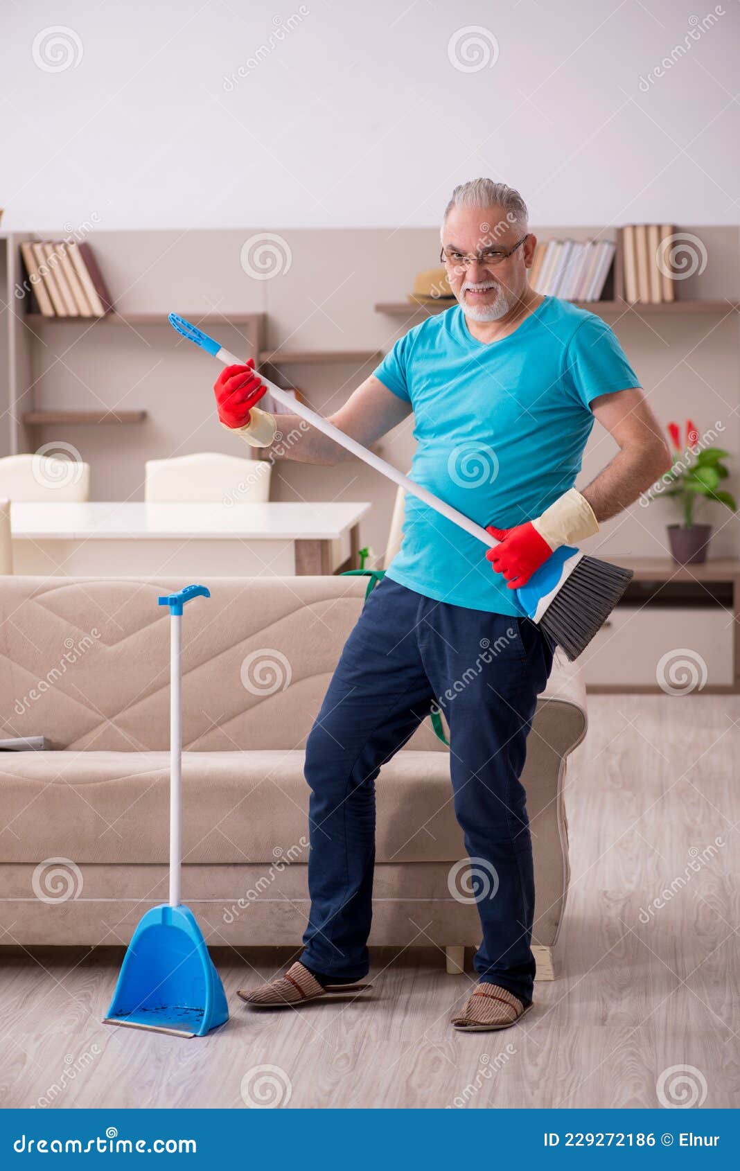Old man cleaning the house stock photo. Image of housekeeping - 229272186
