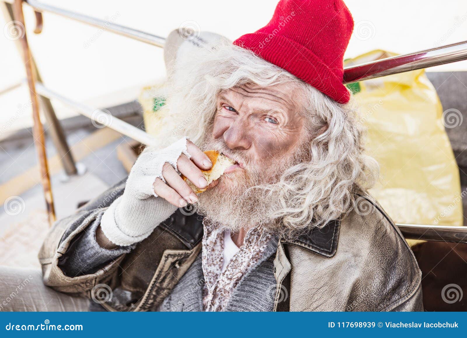 Aged poor man eating stock image. Image of population - 117698939