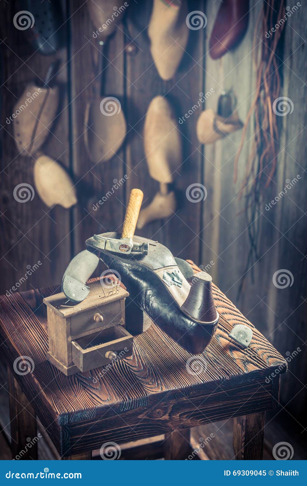 Aged Shoemaker Workshop with Tools, Leather and Shoes Stock Image ...