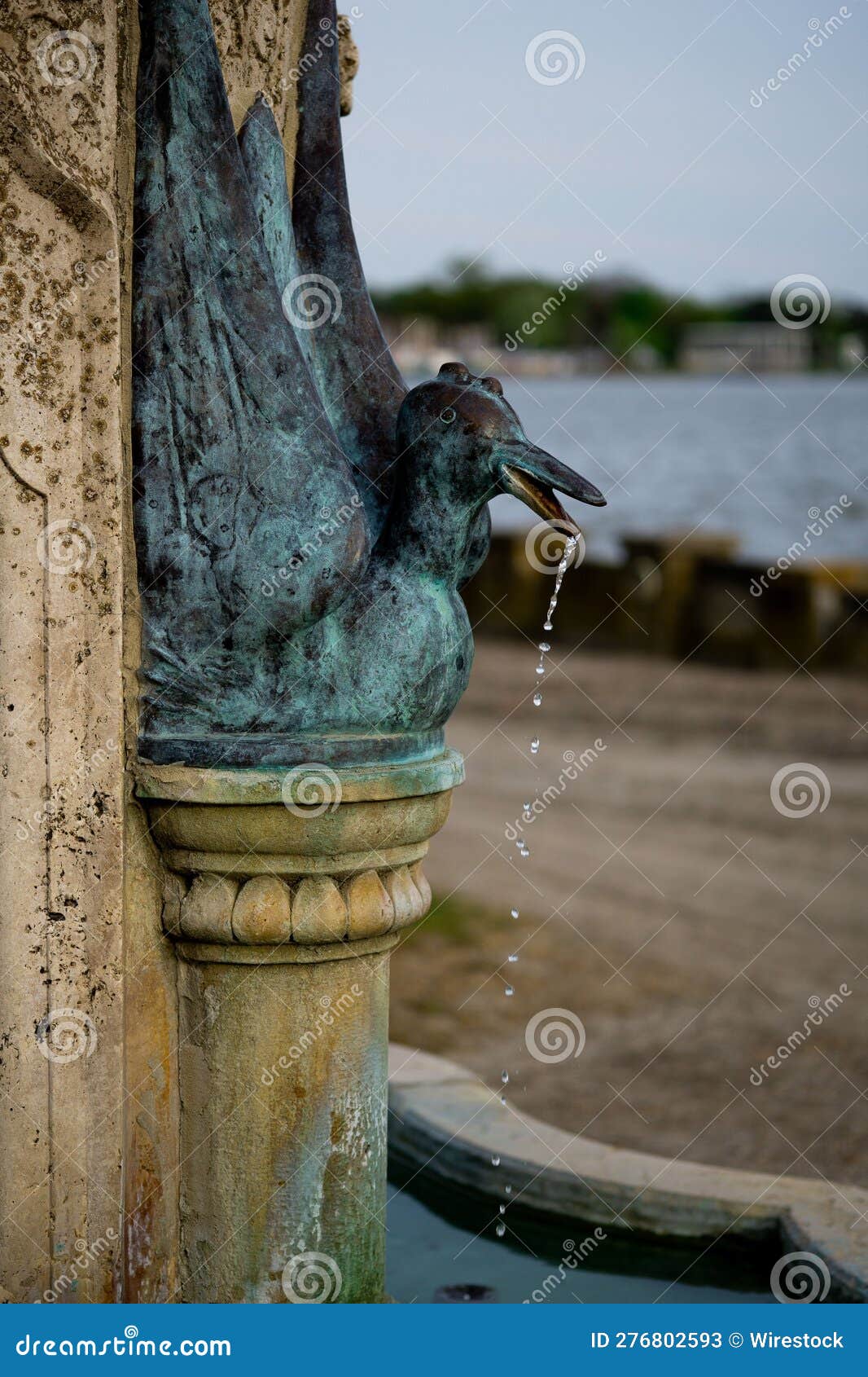 Aged Stone Bird Fountain Dripping Water on a Bridge Editorial Stock ...