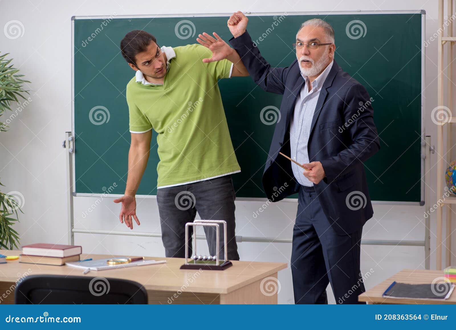 Aged Teacher and Male Lazy Student in the Classroom Stock Photo - Image ...