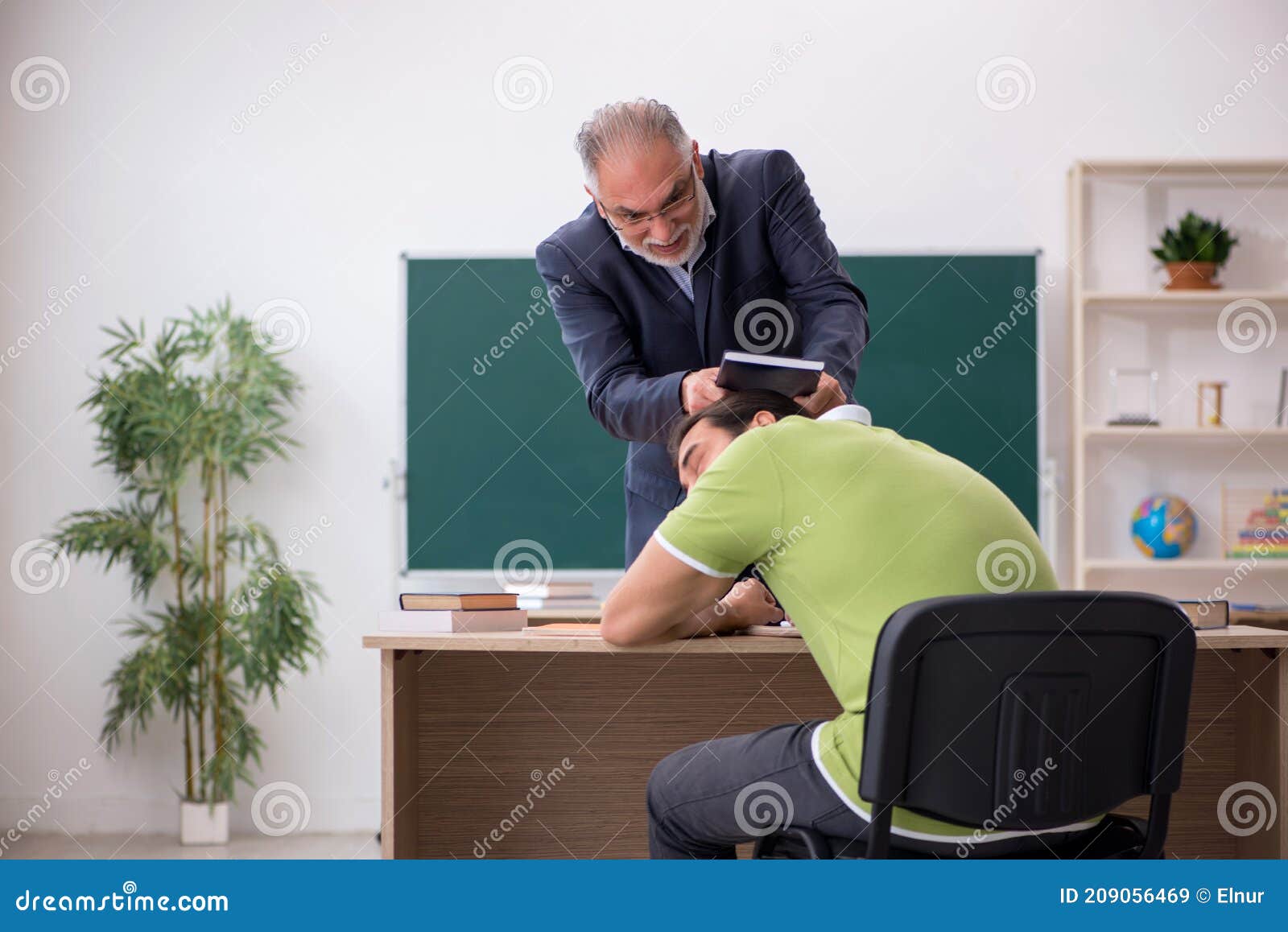 Aged Teacher and Male Lazy Student in the Classroom Stock Image - Image ...