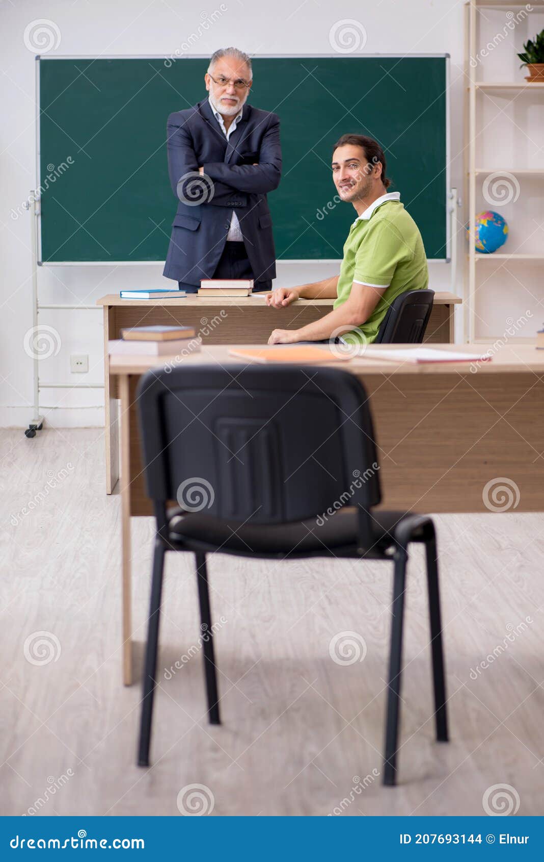 Aged Teacher and Male Student in the Classroom Stock Photo - Image of ...