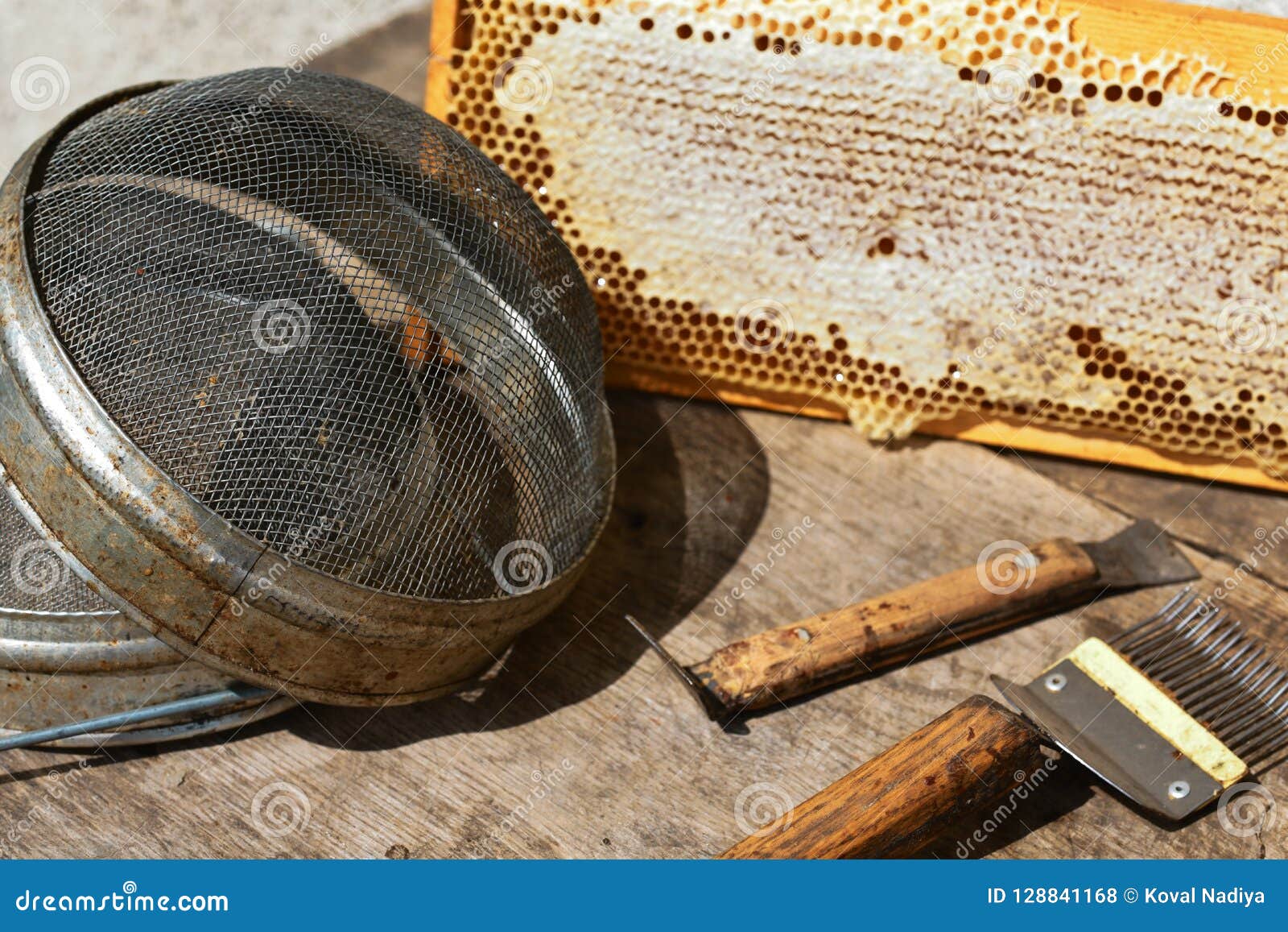 Aged Various Beekeeping Equipment on the Old Wooden Table Stock Photo ...