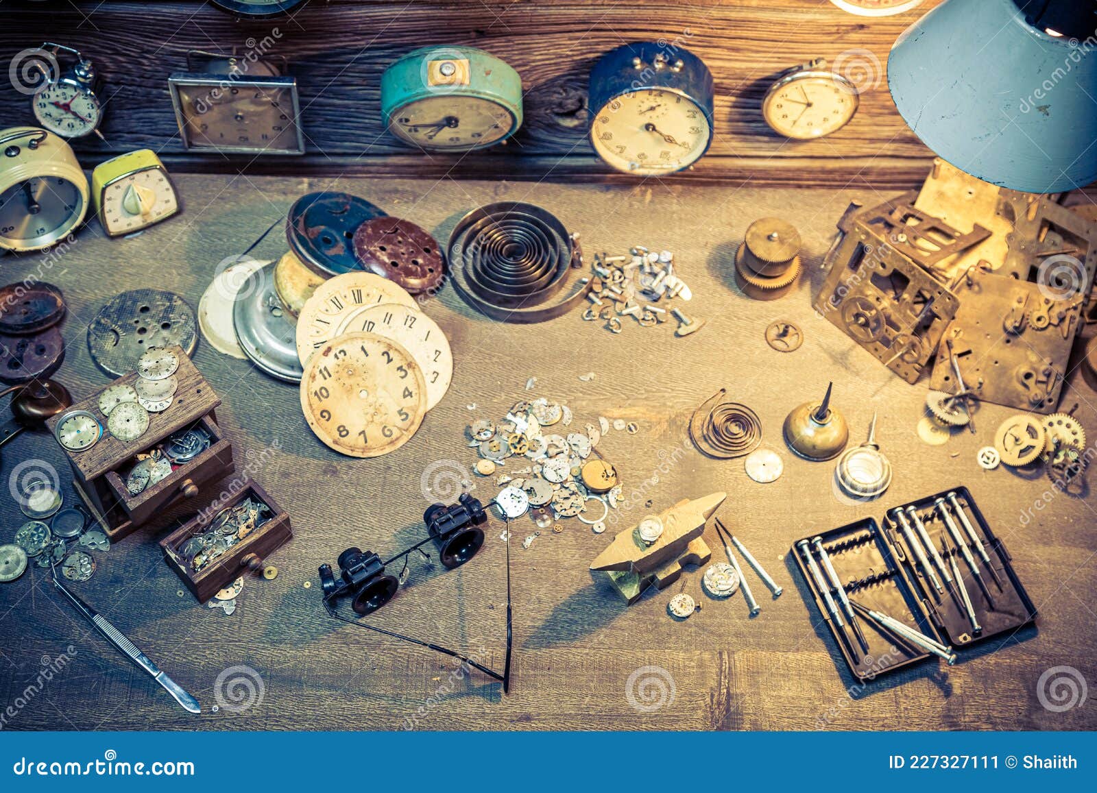 Aged Watchmaker`s Workshop with Repaired Clocks. Ancient Watchmaker`s ...