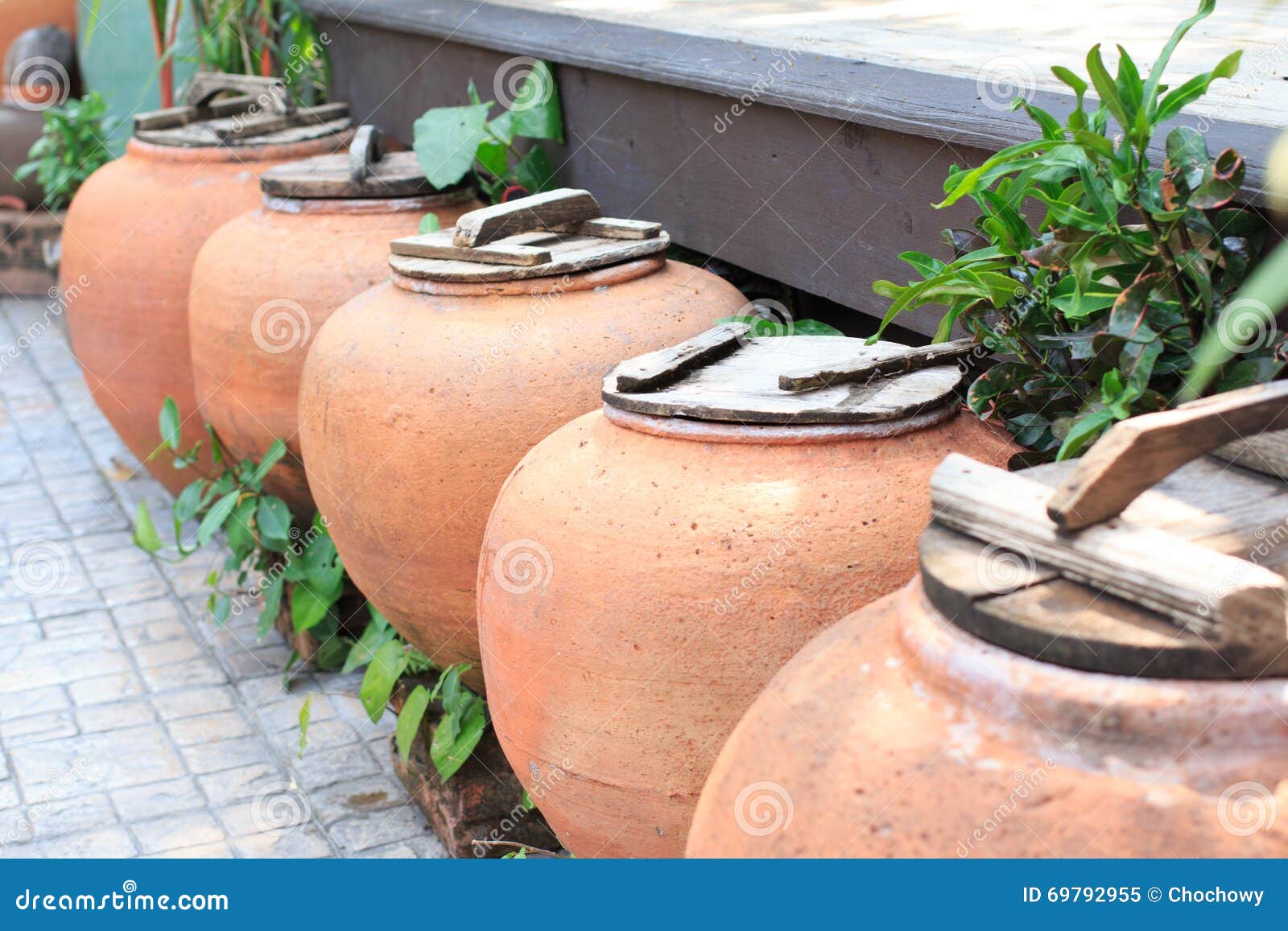 Aged water earthen jar stock image. Image of background - 69792955