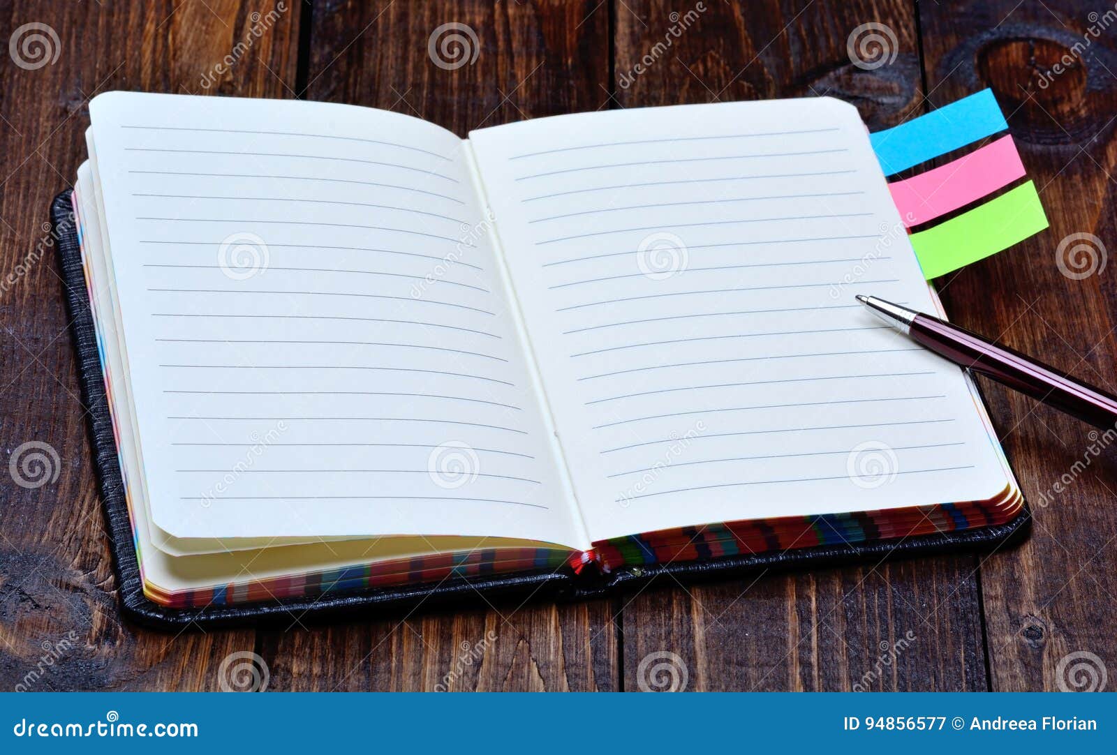 Agenda with pen on desk stock image. Image of notebook - 94856577