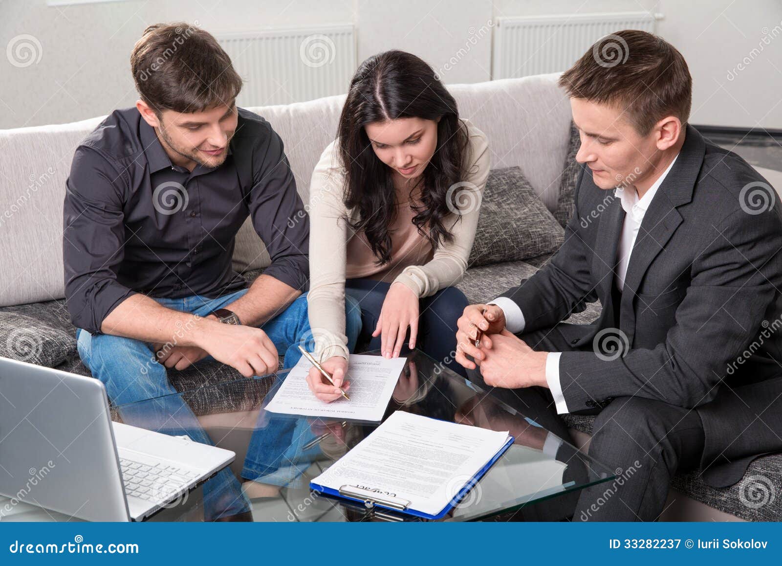 Agent Advises the Couple, Signing Documents Stock Image - Image of ...
