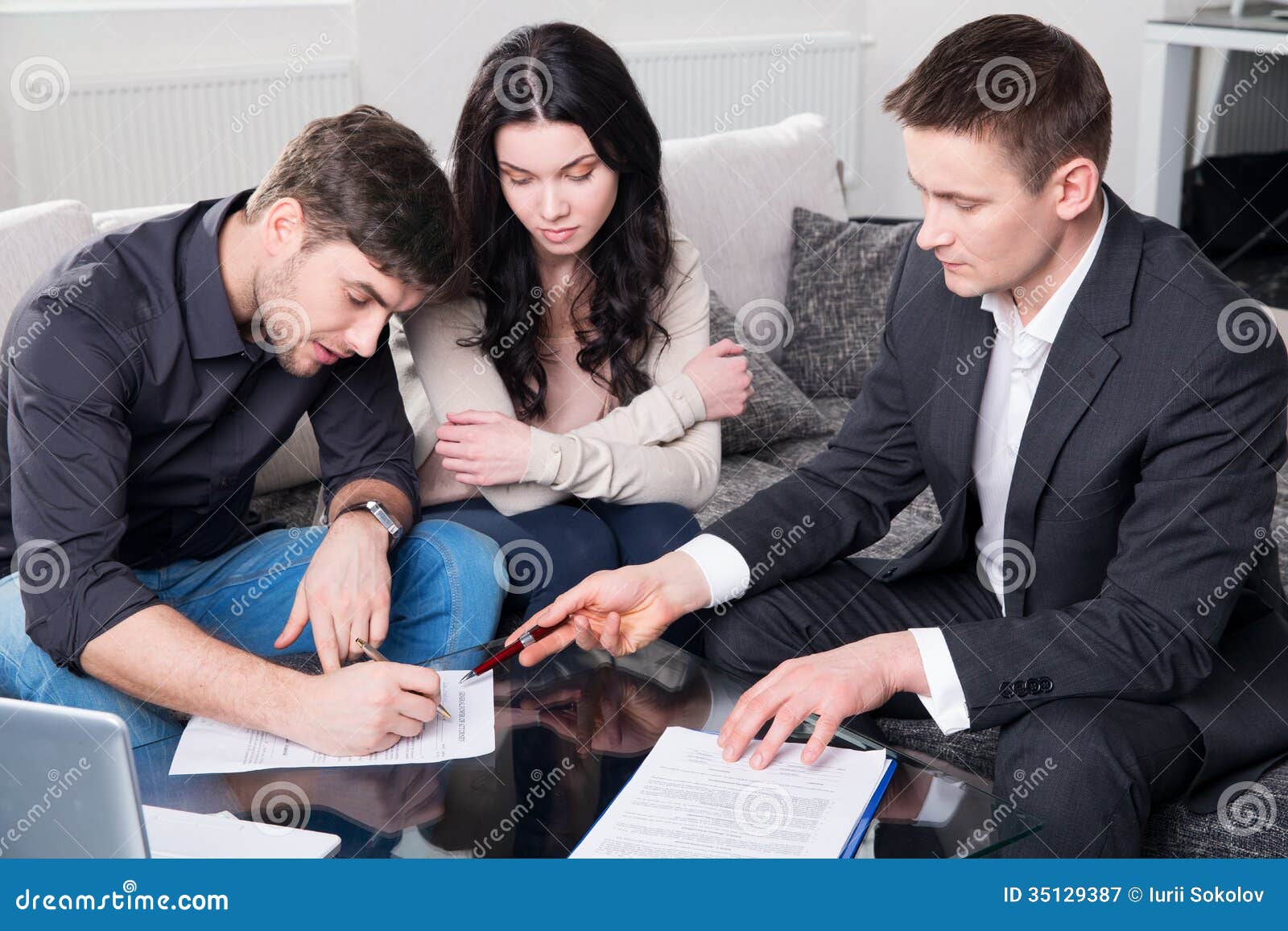 Agent Advises the Couple, Signing Documents Stock Image - Image of ...
