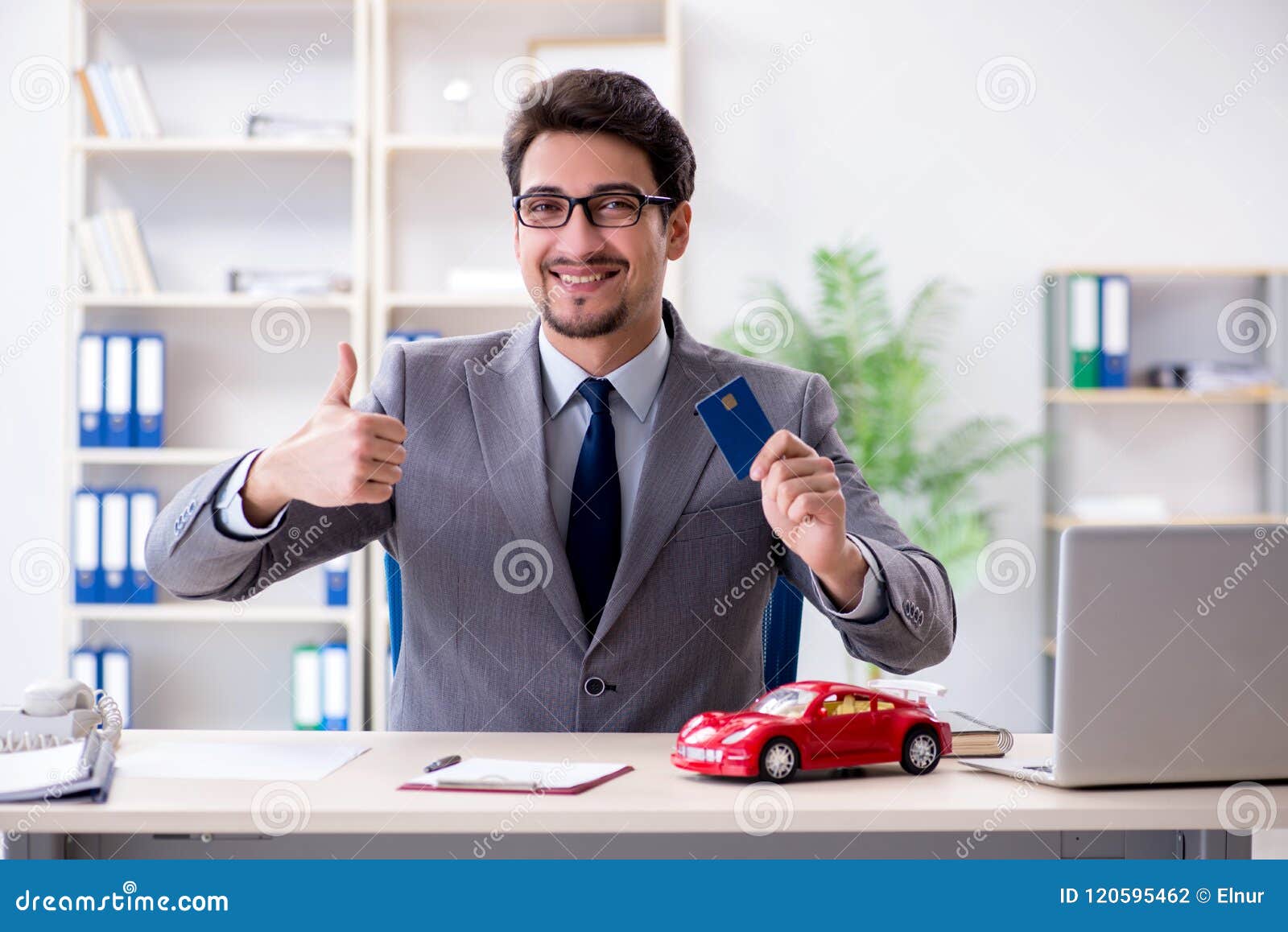 The Agent Offering Car Motor Insurance Stock Photo - Image of indemnity ...