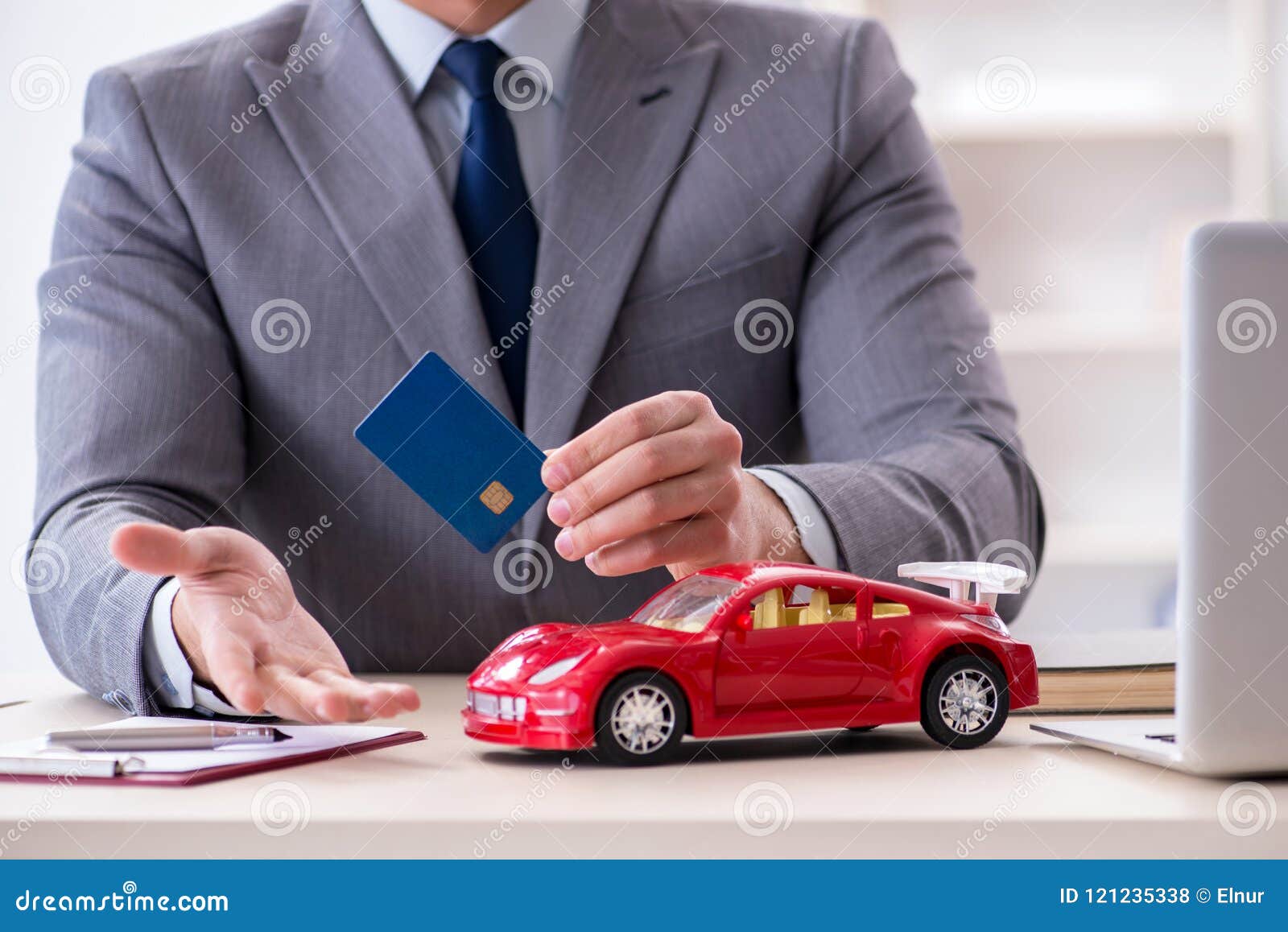 The Agent Offering Car Motor Insurance Stock Photo - Image of agent ...