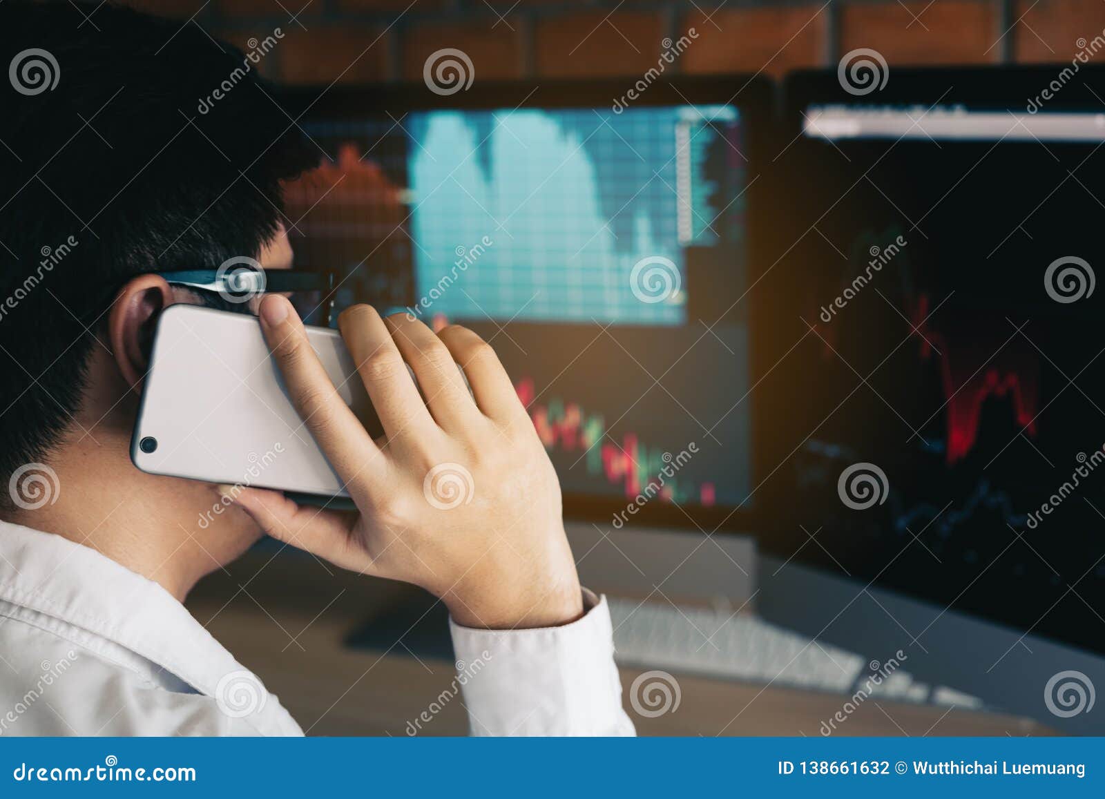 Agent Trader Man Talking at Telephone and Checking Business Stock Data ...