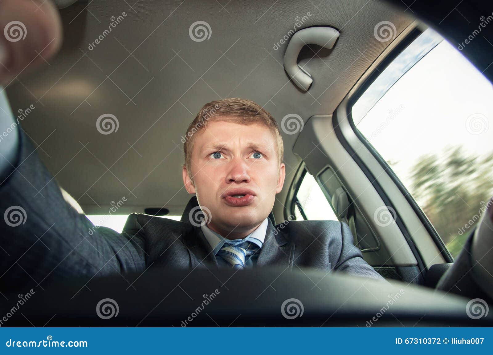 Aggression Behind the Wheel, the Driver is Surprised while Driving ...