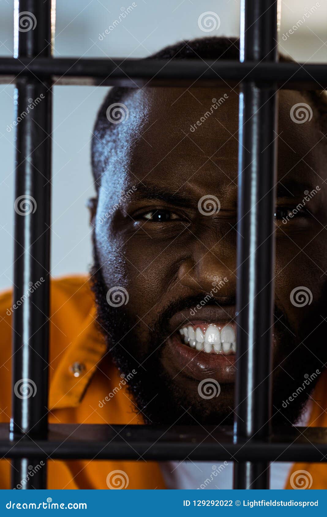 Aggressive Prisoner Holding Bars And Waiting For Guard, Inadequate ...