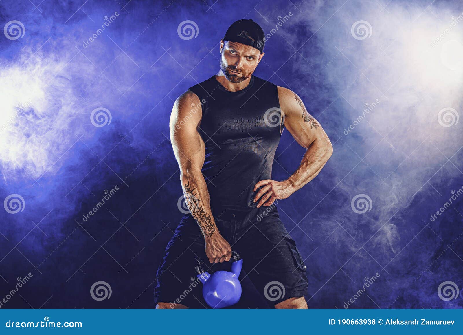 Aggressive Bearded Muscular Bodybuilder Doing Exercise for the Biceps ...