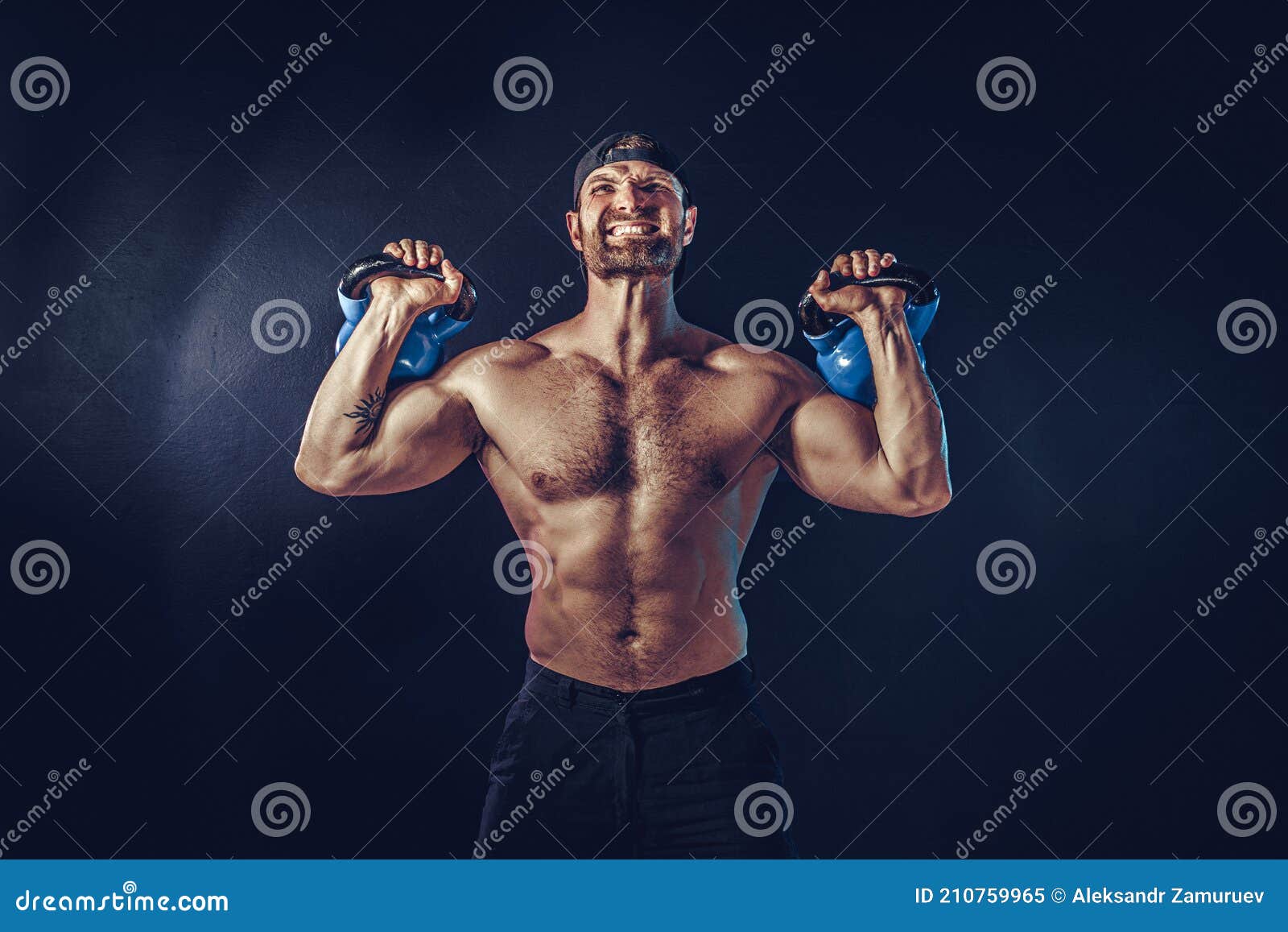 Aggressive Bearded Muscular Bodybuilder Doing Exercise for the S Stock ...